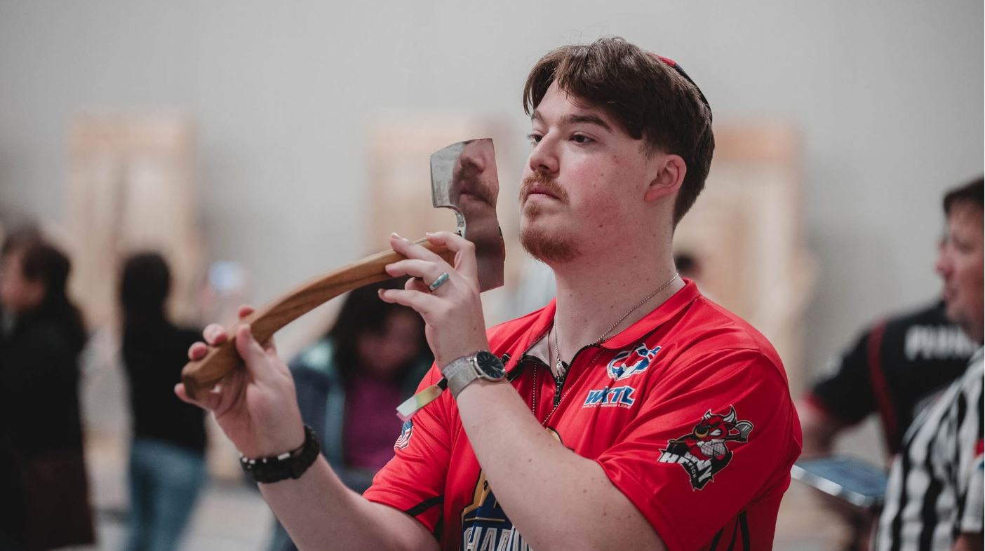 At the world axe throwing competition in Appleton, a New Yorker brought ...